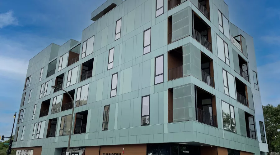 ACM Panels Elegantly Wrap Apartment Complex | Building Enclosure